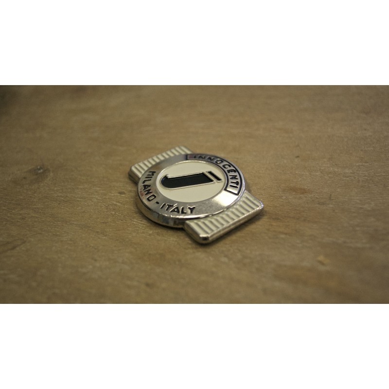 Innocent front-facing badge.